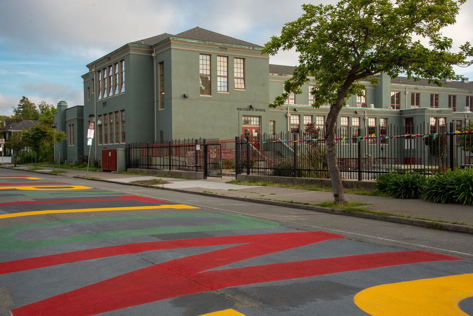 Berkeley 'Reparations Now' mural repainted on Ellis Street